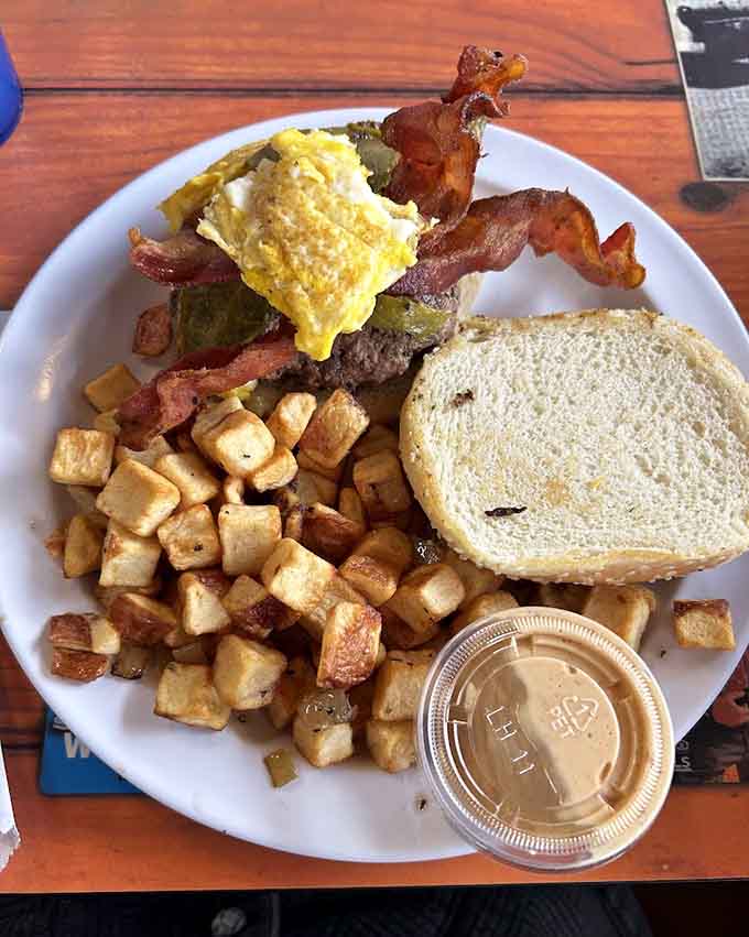 This breakfast plate looks like it's preparing you for a day of lumberjacking, complete with enough protein to fuel any adventure.