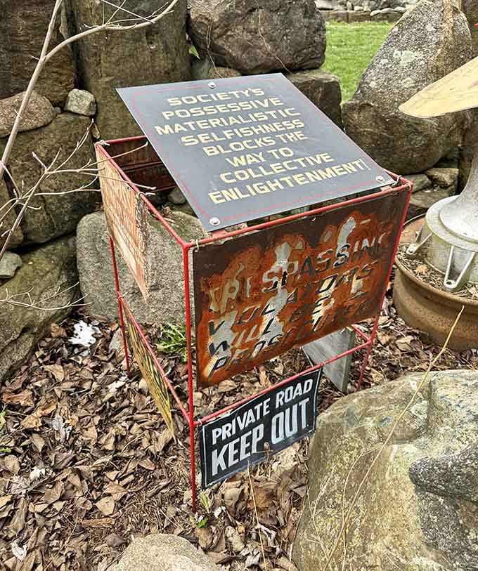 Even the signs here carry weight, reminding visitors that society's obsession with material possessions might be blocking the path to enlightenment, or at least the garden path.