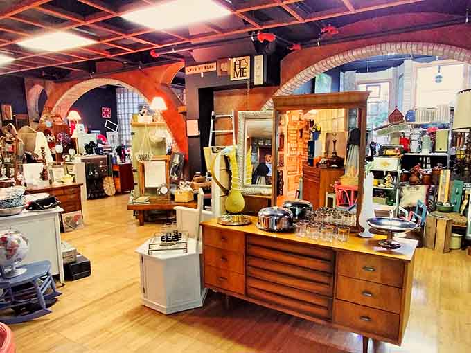 Vintage oil cans and advertising signs remind us that even mundane products once had beautiful, artistic packaging worth preserving and admiring decades later.