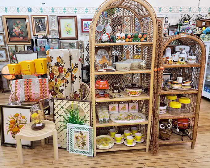 Wicker shelves showcase the colorful history of American kitchens &ndash; those harvest gold and avocado pieces your mother swore she'd never miss.