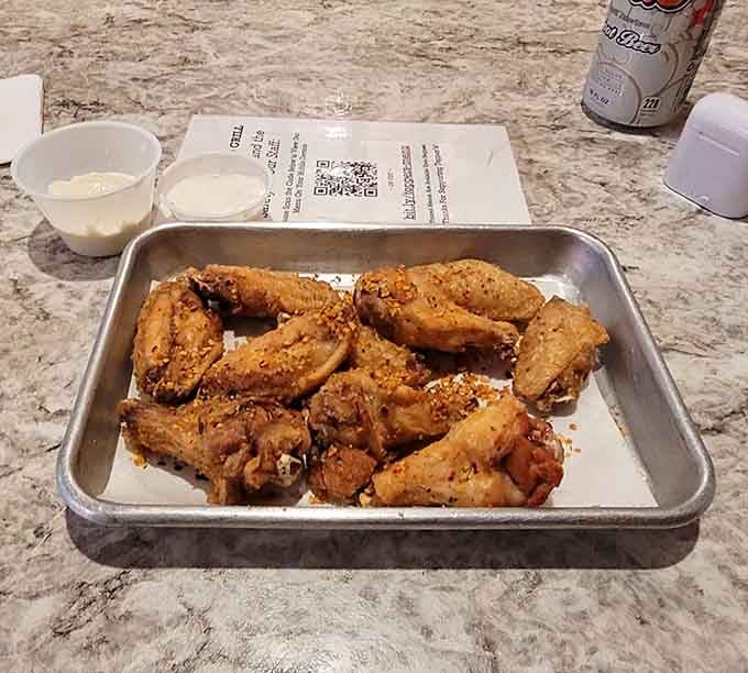 These golden chicken wings arrive ready to satisfy that craving for something crispy, saucy, and completely delicious.