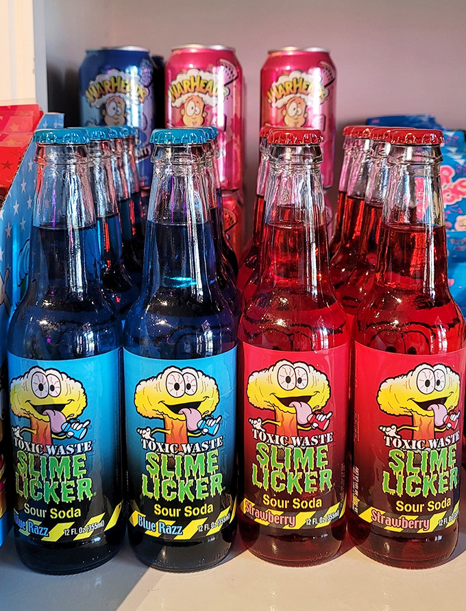 Toxic Waste Slime Licker sodas dare brave taste adventurers with their neon colors and cartoon mascots. Your tongue will change color, but your smile will remain!