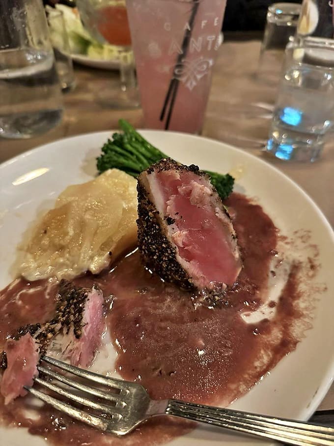 Pepper-crusted tuna, seared rare and sliced to show off its ruby interior&mdash;proof that seafood this far from an ocean can still dazzle.