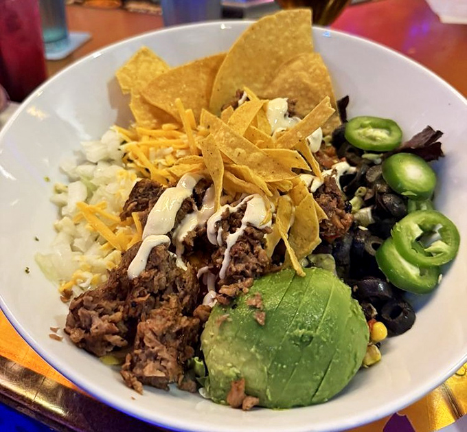A fiesta in a bowl where avocado reigns supreme&mdash;proof that Geddy's vegetarian options dance to the same flavorful beat as their seafood stars.