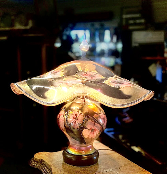 This ethereal art glass lamp catches light like a captured rainbow, proving they really don't make them like this anymore.