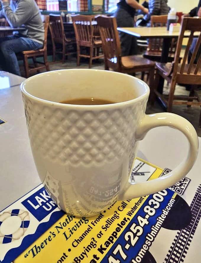 Fresh coffee in classic diner mugs tastes better when you're surrounded by good food and even better company.