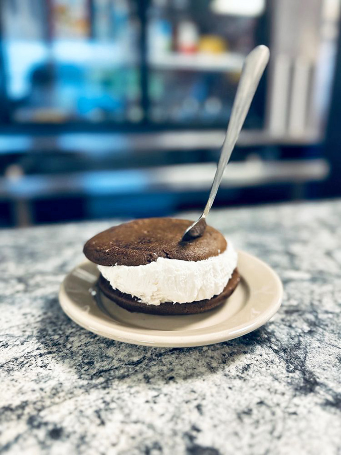 Sweet finale: A chocolate whoopie pie with generous cream filling &ndash; Maine's beloved treat executed to perfection.