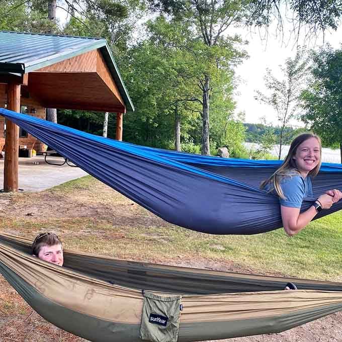 Hammock life is the good life, especially when you're suspended between trees with lake views that make you forget what day it is.