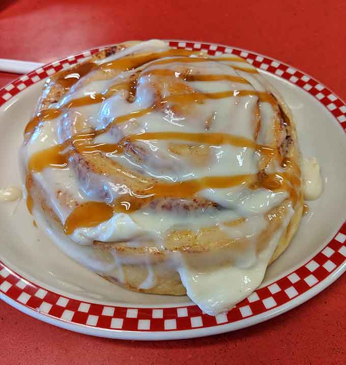This cinnamon roll could double as a flotation device, drizzled with icing and still warm from the oven.