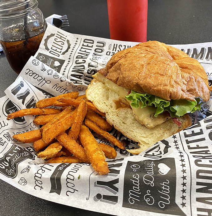 A croissant sandwich that puts fast food breakfast to shame, paired with sweet potato fries that might make you temporarily forget those famous home fries.