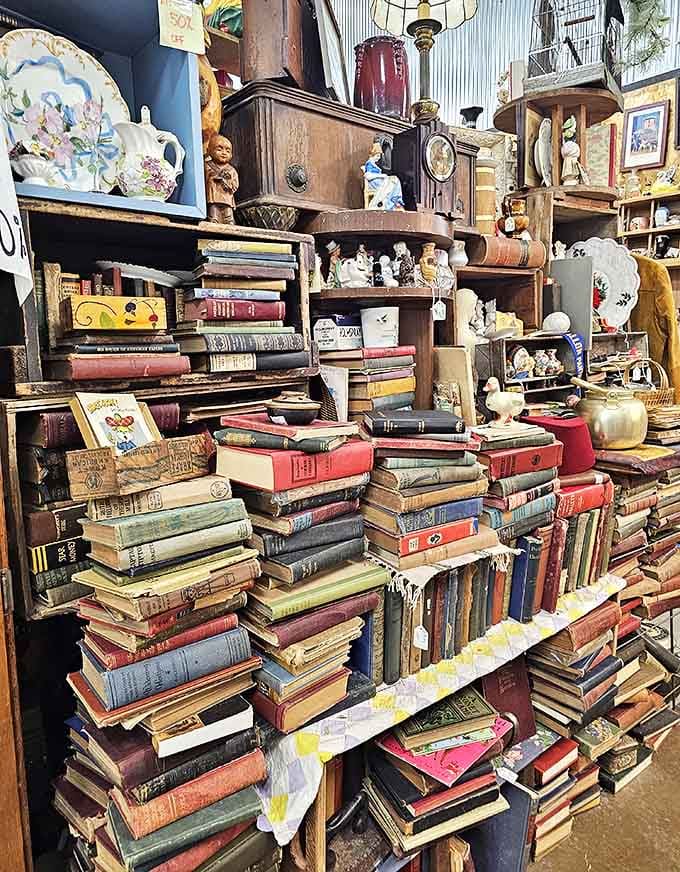Books stacked like literary skyscrapers offer everything from first editions to cookbooks featuring alarming amounts of gelatin and mayonnaise.