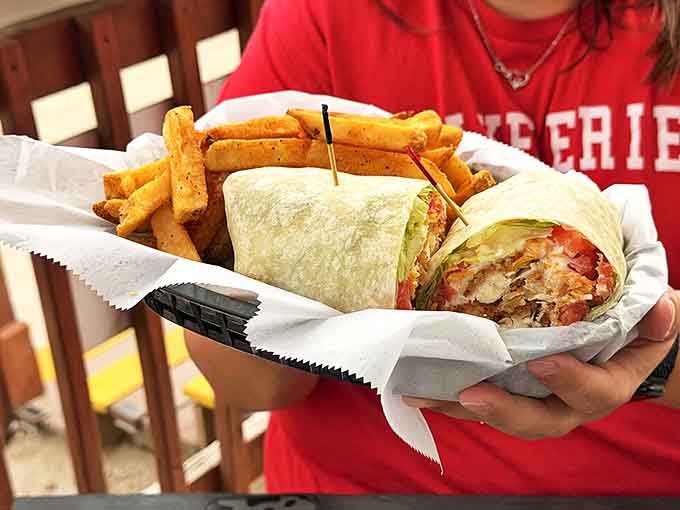 The buffalo chicken wrap arrives like a flavor torpedo &ndash; crispy, spicy, cool, and creamy all wrapped up in one perfect handheld package.