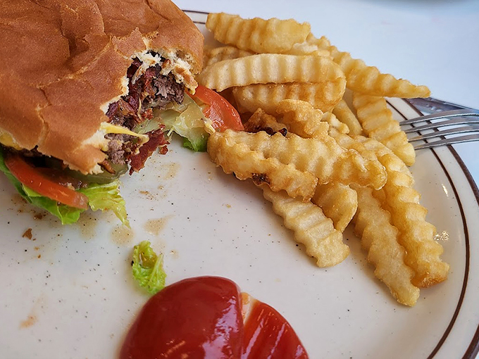 Meet the burger that will make you forget your name. With a side of fries so crispy, they could moonlight as rhythm sticks for a 50s doo-wop group.