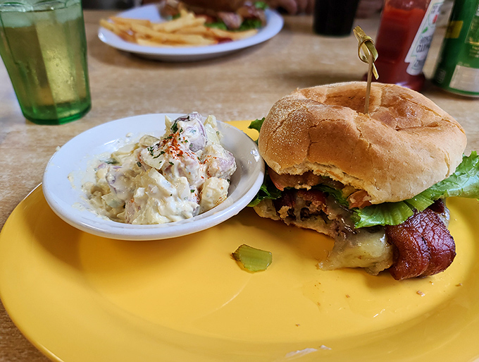 This isn't just any burger &ndash; it's the kind that tastes like it came from the best backyard BBQ, with potato salad that grandma would approve.