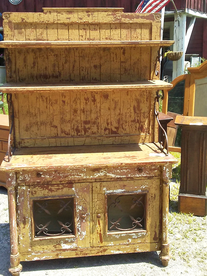 This weathered wooden hutch with its original patina could become the statement piece your dining room never knew it needed.