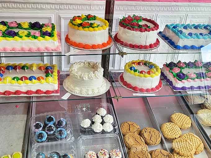 The cake display showcases old-school decorating techniques that prioritize flavor over flash &ndash; birthday celebrations done right for generations of local families.