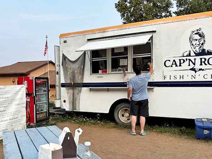 The moment of truth &ndash; a hungry customer places their order, about to discover why locals make pilgrimages to this unassuming food truck.