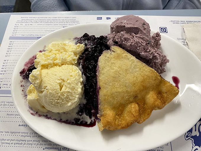 Dessert nirvana: warm blueberry pie swimming in its own purple juices, flanked by vanilla and blueberry ice cream &ndash; Maine's sweet finale.