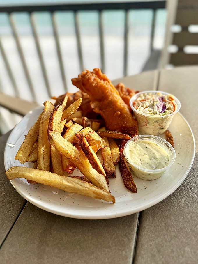 Fish and chips done right: golden-battered fish alongside hand-cut fries that could make a British pub jealous.