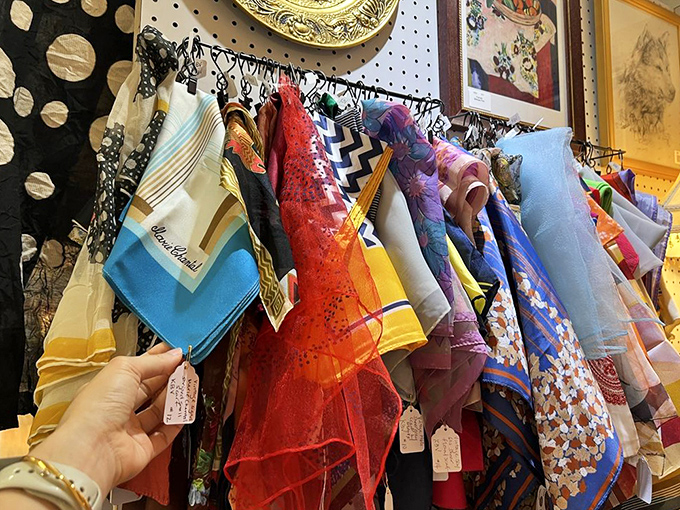 Colorful vintage handkerchiefs and scarves showcase textile art from simpler times, when even everyday items were made with beauty in mind.