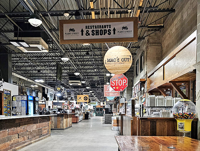 Wooden signs hanging from exposed beams guide hungry explorers through this gastronomic wonderland of local treasures.
