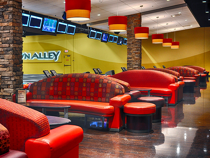 Comfortable lounge areas invite conversation and relaxation between games, proving Uptown Alley understands the importance of pacing your fun. Strategic resting!
