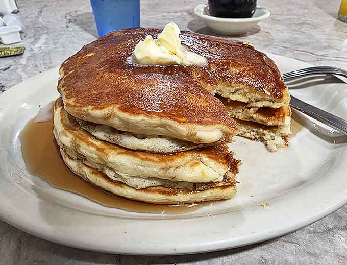 Stack attack! These pancakes achieve the perfect balance &ndash; crispy edges, fluffy centers, and just waiting for that maple syrup waterfall.