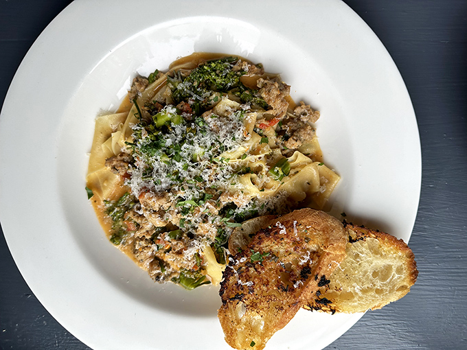 Pappardelle pasta embraces a hearty sauce with the enthusiasm of old friends reuniting after too long apart.