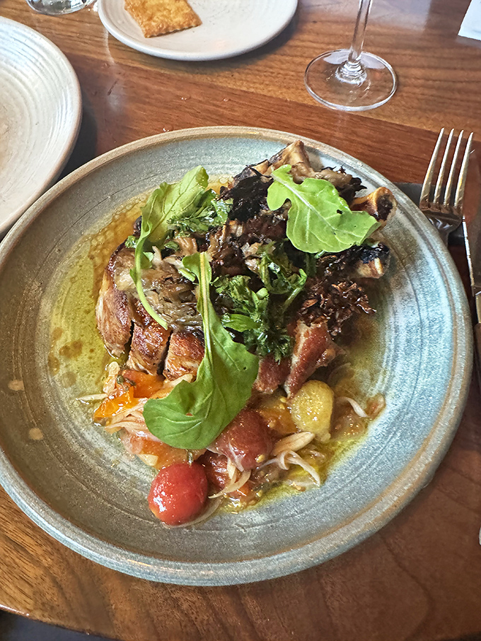 A pork dish that showcases the kitchen's philosophy: respect the ingredient, cook it perfectly, and let its natural flavors shine through thoughtful accompaniments.