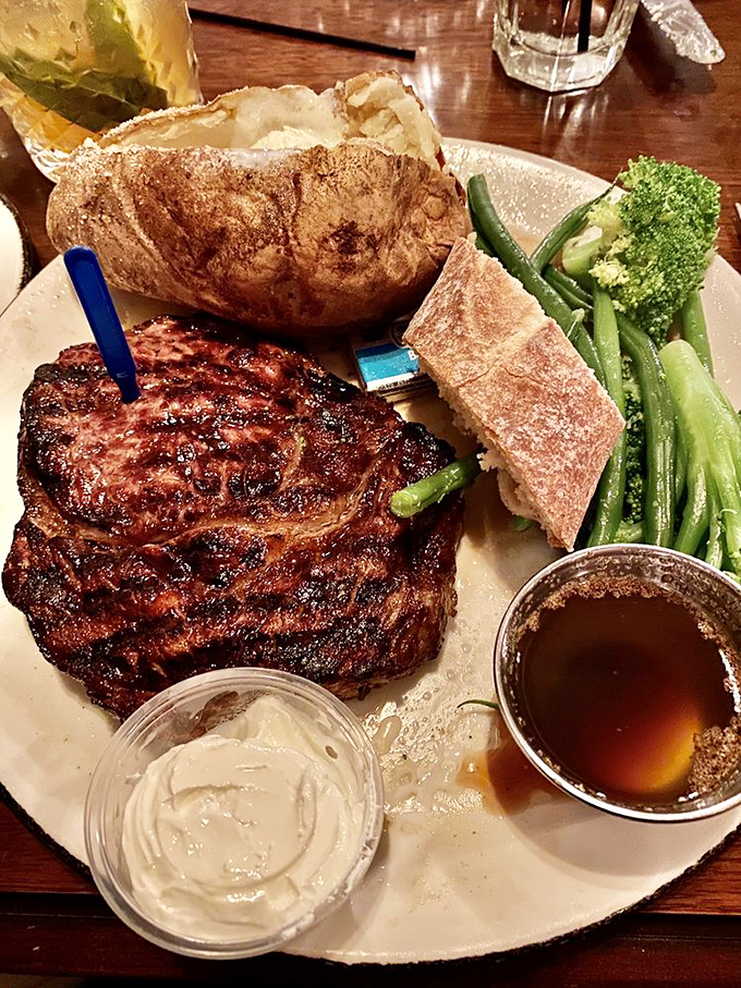 A steak so good, it might make vegetarians reconsider their life choices. Paired with a baked potato that's living its best life.