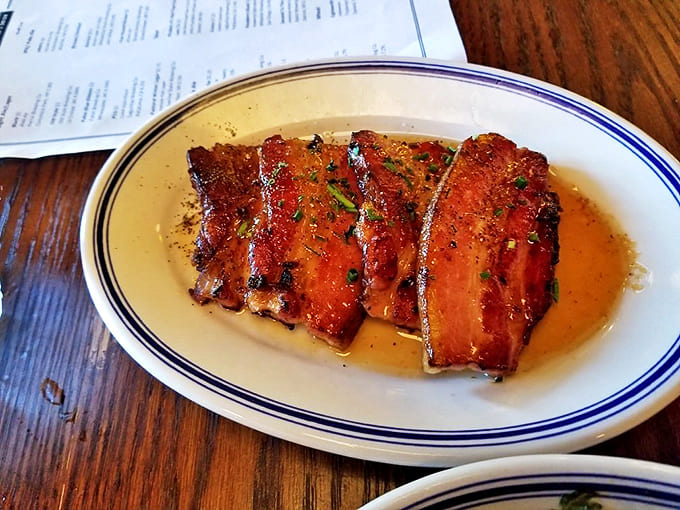 Our roasted pork belly is melt-in-your-mouth tender, finished with a sweet glaze and fresh herbs for a truly savory bite.