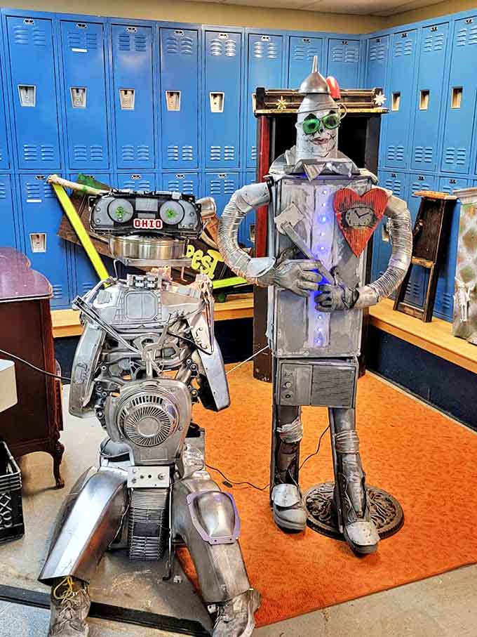 Mechanical marvels stand guard by blue lockers &ndash; these repurposed robot sculptures prove creativity can transform ordinary objects into extraordinary art.