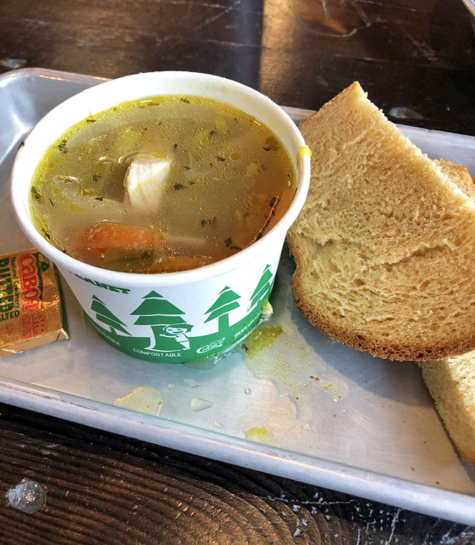 Homemade soup served with a side of fresh bread &ndash; the kind of simple, perfect lunch that reminds you why comfort food earned its name.
