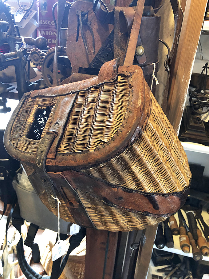 This vintage fishing creel isn't just practical craftsmanship &ndash; it's a woven vessel of stories about "the one that got away."