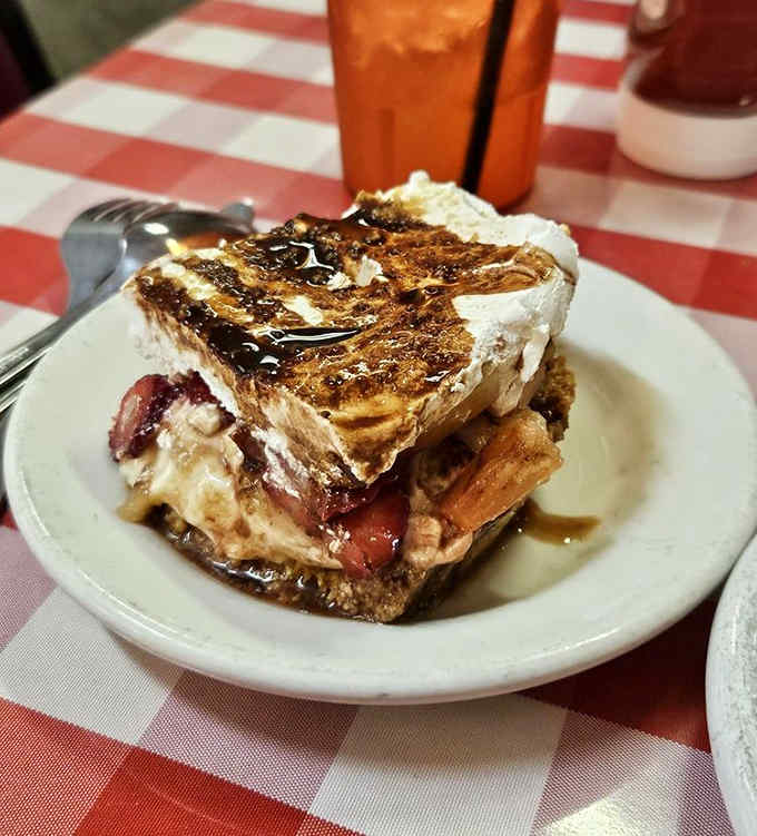 Layer upon heavenly layer of banana, cream, and cake drizzled with syrup &ndash; dessert masquerading as breakfast and nobody's complaining.