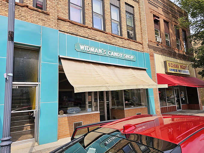 Mint green and full of dreams (and chocolate). The storefront is like the cool, calm prelude to a sugar-fueled symphony.