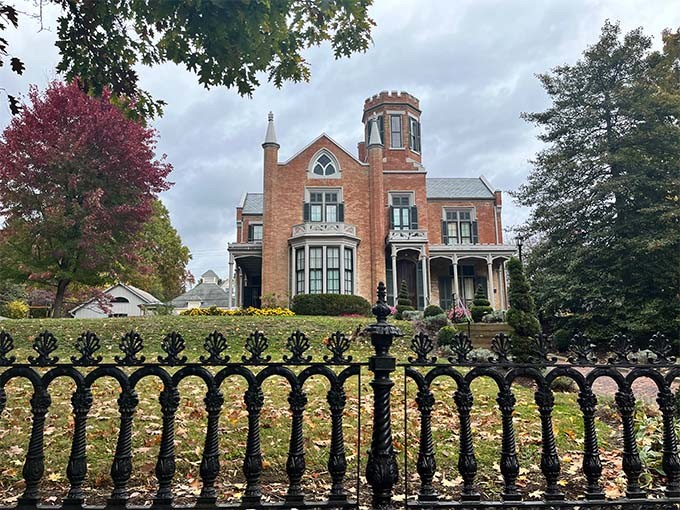 The Castle Historic House Museum combines Gothic elegance with American craftsmanship, its warm stone walls glowing in the Marietta sunshine.
