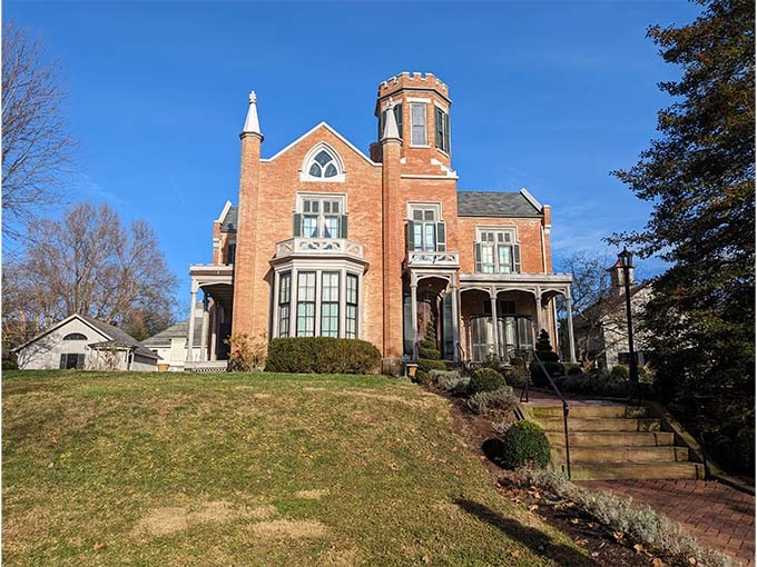 Every angle of this historic treasure reveals new details, from dormer windows to the distinctive tower that crowns this architectural gem.