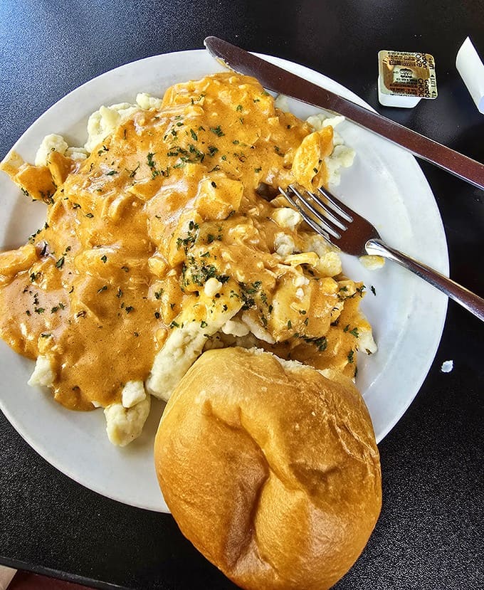 Tender chicken swimming in rich, creamy sauce over pillowy sp&auml;tzle &ndash; a Hungarian hug on a plate that warms from the inside out.