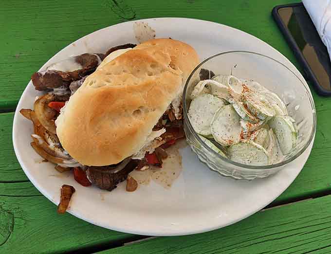 The Philly cheesesteak sandwich arrives loaded with meat, cheese, and pure satisfaction guaranteed.