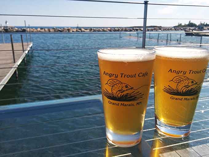 Cold local beer with a lake view is basically the Minnesota version of paradise, especially when the sun is shining just right.