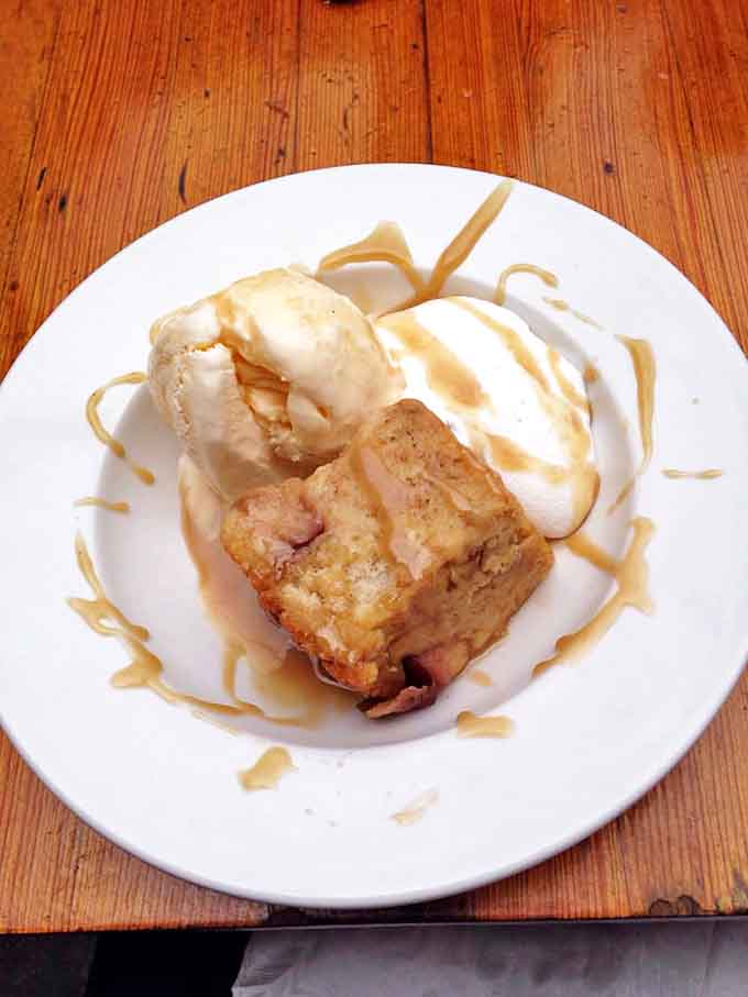 Bread pudding that could end arguments &ndash; warm, cinnamon-scented comfort topped with vanilla ice cream creating the perfect hot-cold harmony.