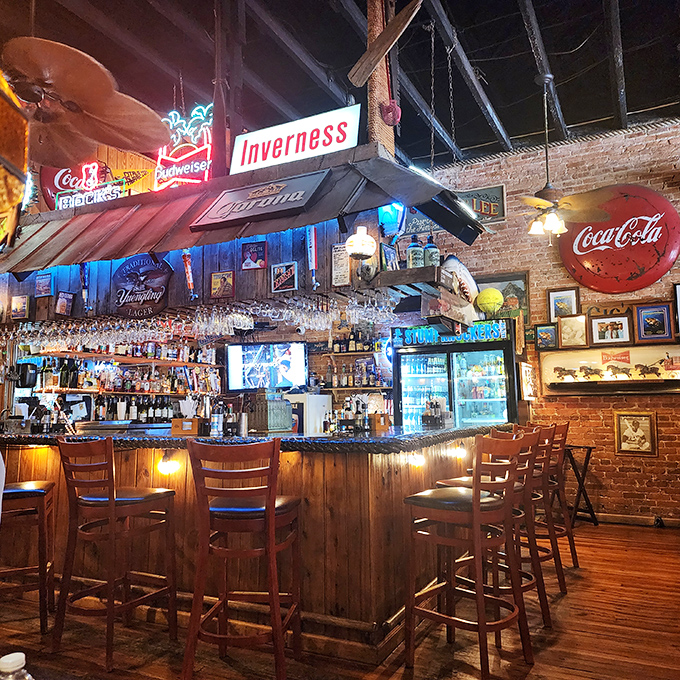 The bar area, with its vintage "Inverness" sign, serves up cold drinks and warm conversation in equal measure.