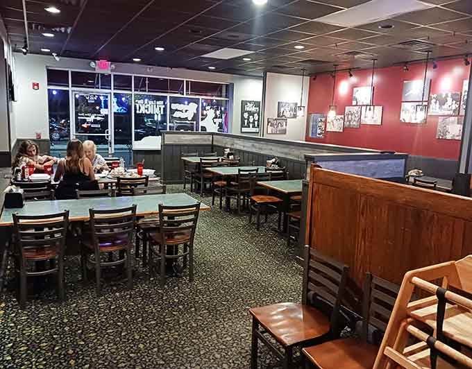 Happy diners enjoying their meals in the comfortable dining room, where every table tells a story of satisfied appetites and good times.