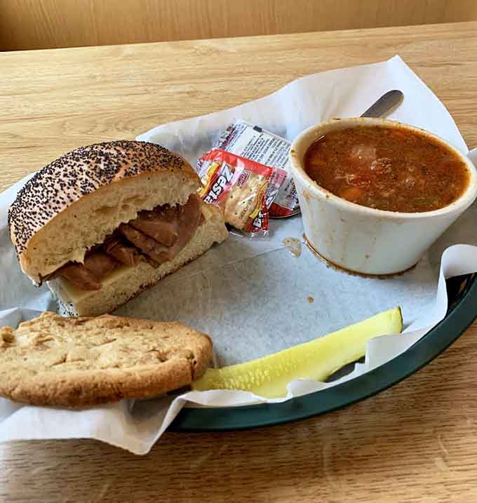 The classic combo of hearty sandwich and steaming soup represents deli perfection, the kind of meal that satisfies both stomach and soul.