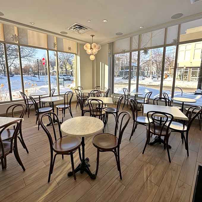 Corner seating with natural light streaming in makes this the kind of spot where time slows down just enough.