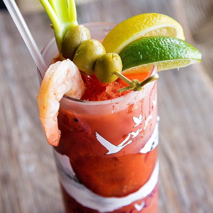 This Bloody Mary isn't just a cocktail; it's a meal with a drinking problem, complete with a shrimp hitchhiker.