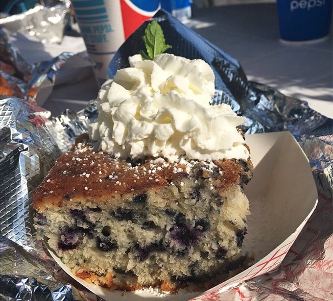 Blueberry cake topped with fresh whipped cream, the perfect sweet finale to a seafood feast at Maine's most famous shack.