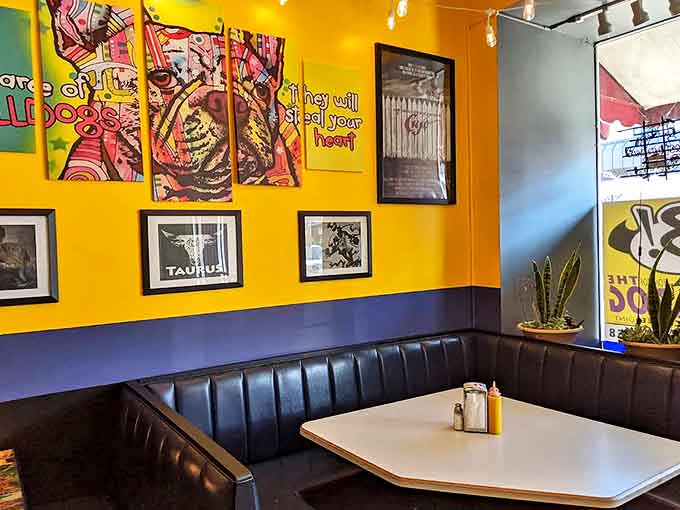 Cozy booths lined with superhero art invite you to linger over your meal while debating the finer points of comic universes.
