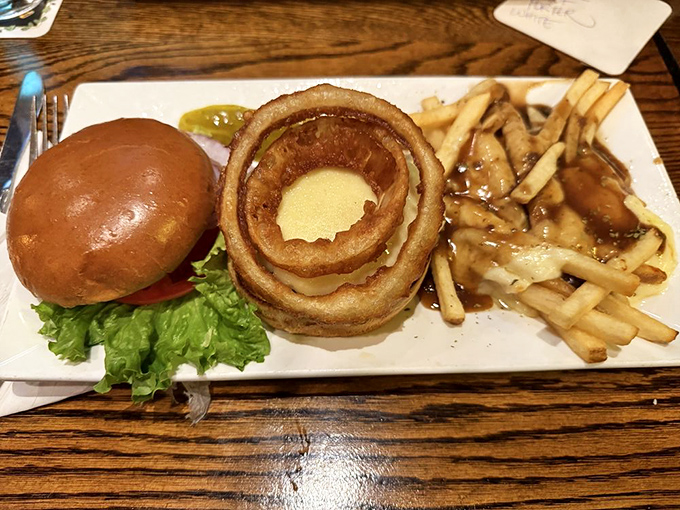 A juicy burger alongside poutine with perfectly melted cheese curds &ndash; proof that Canadians don't have a monopoly on this comfort classic.